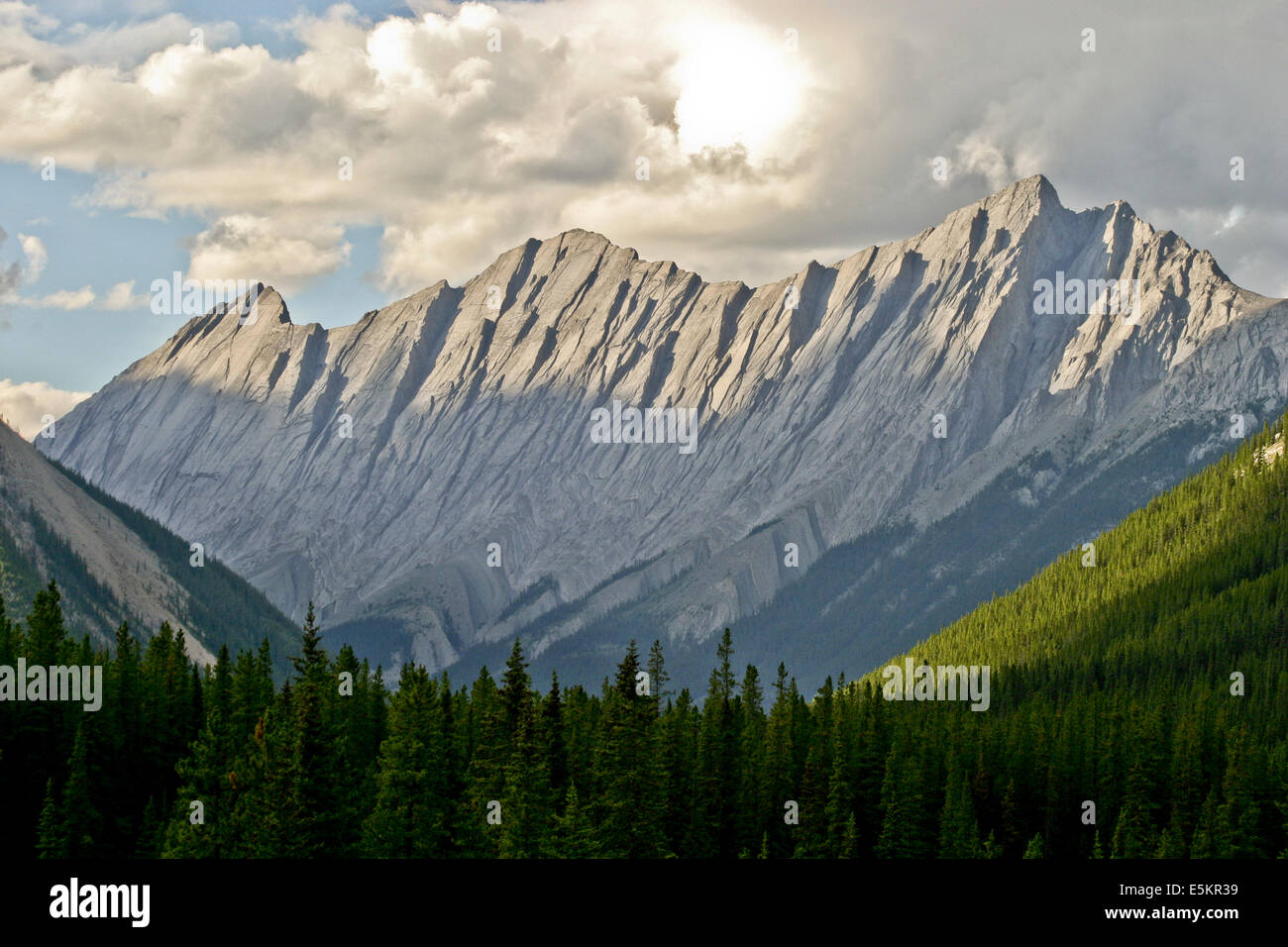 The sun sets on the Colin Range in Jasper National Park Alberta Canada ...