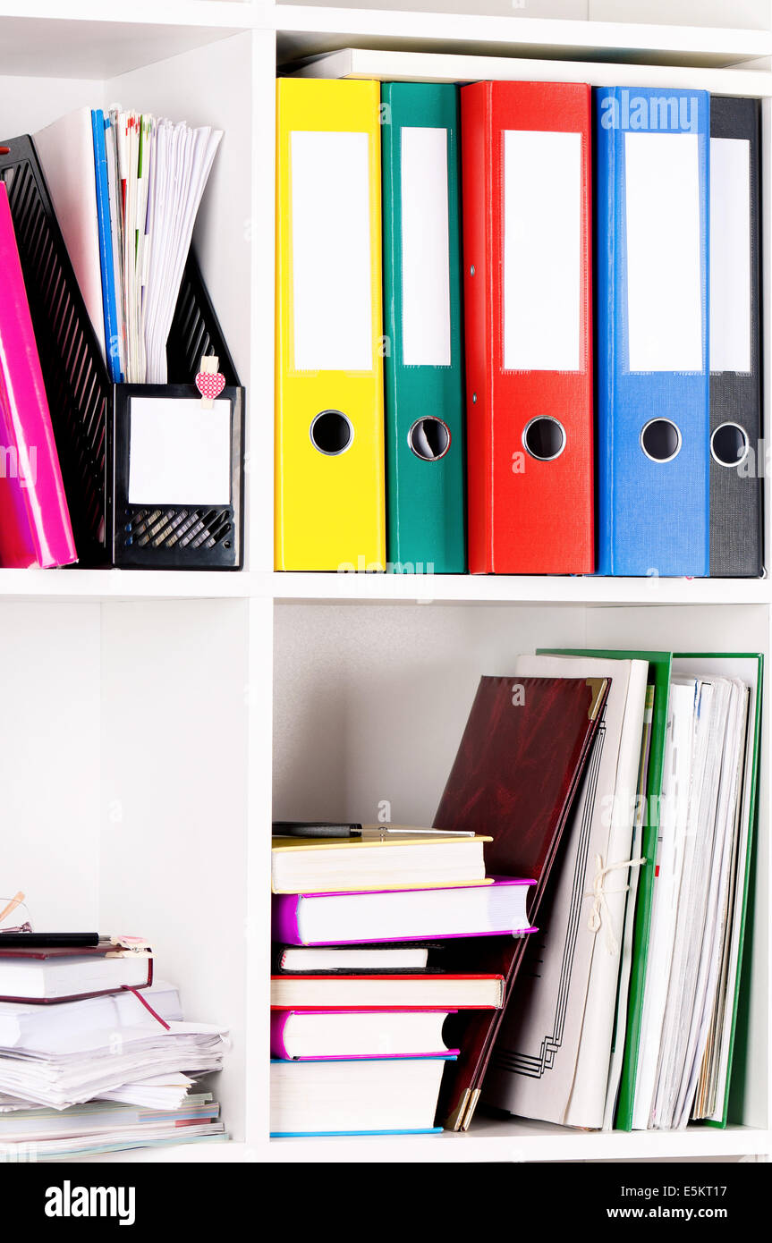 Folders on shelves Stock Photo - Alamy