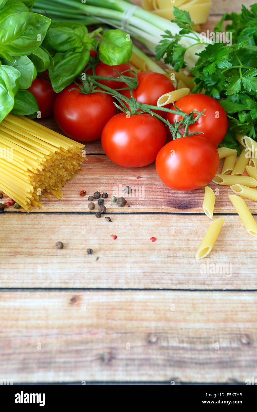 Italian pasta on the wooden background, food Stock Photo - Alamy