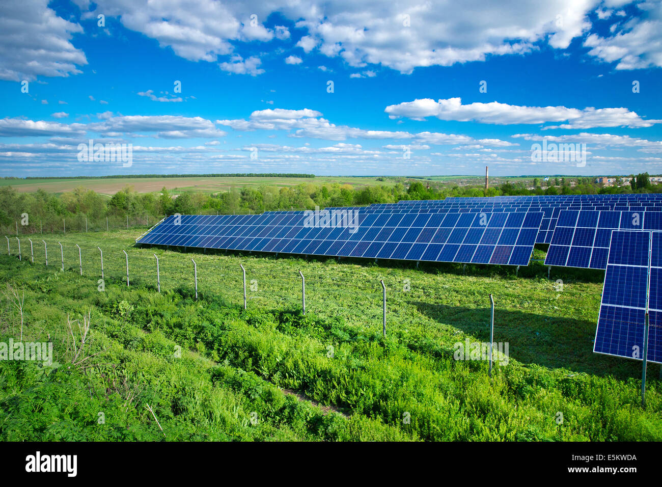 Solar energy panels against sunny sky Stock Photo - Alamy
