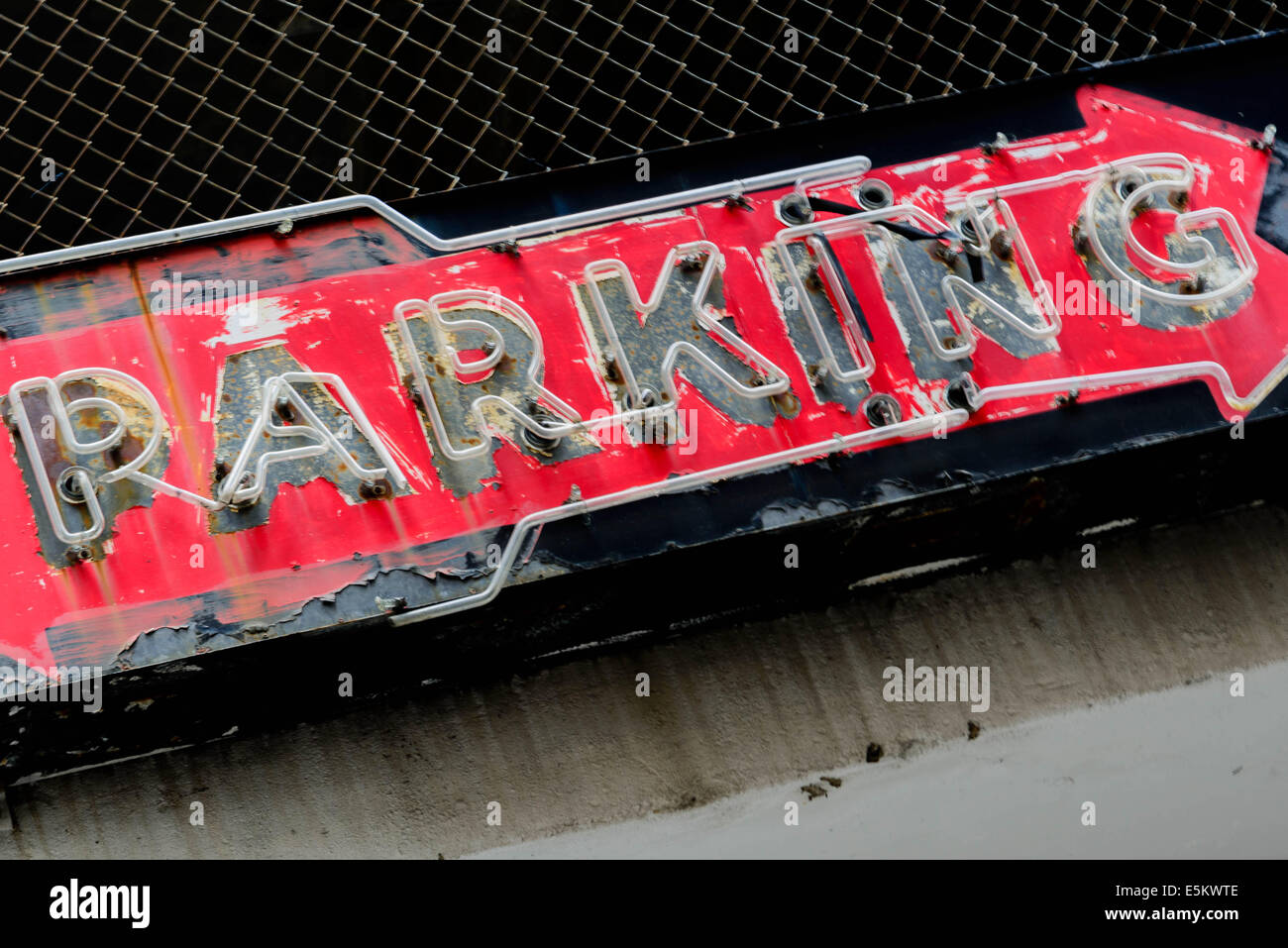 old neon parking sign on a downtown parking garage Stock Photo - Alamy