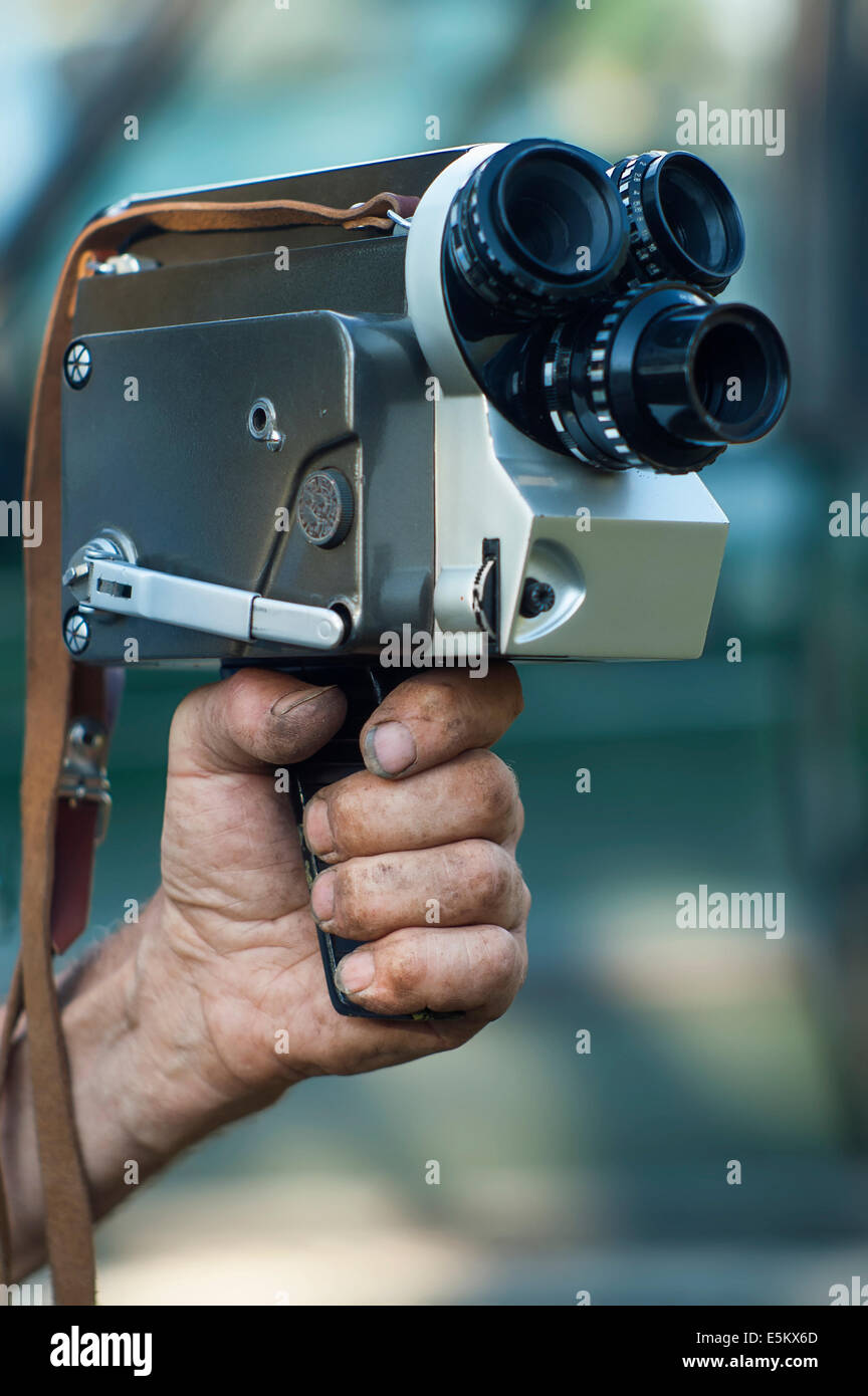 Hand holding a retro camera Stock Photo - Alamy