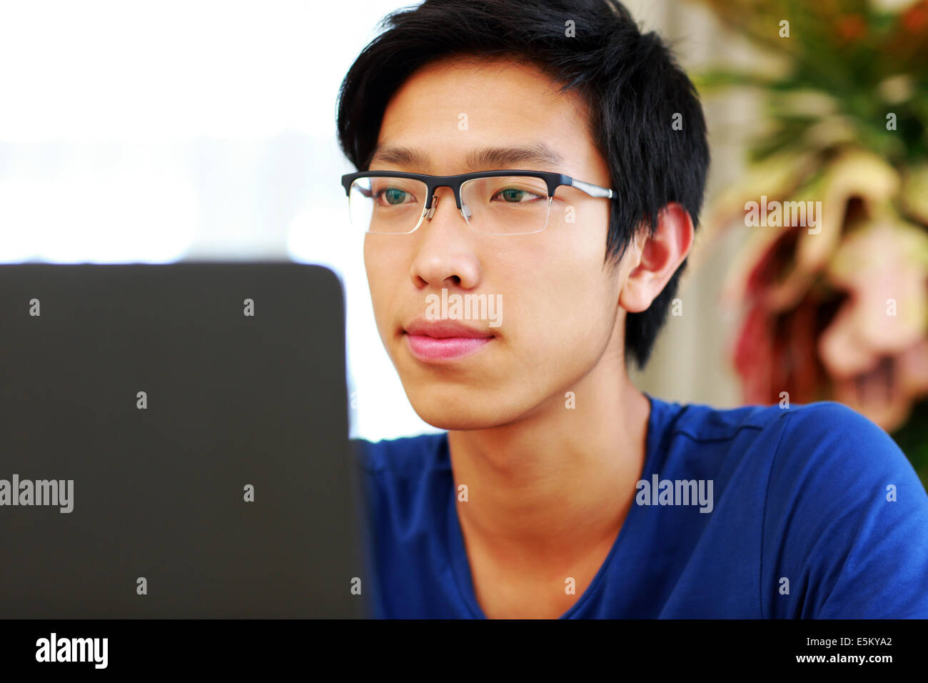 Asian man laptop desk hi-res stock photography and images - Alamy