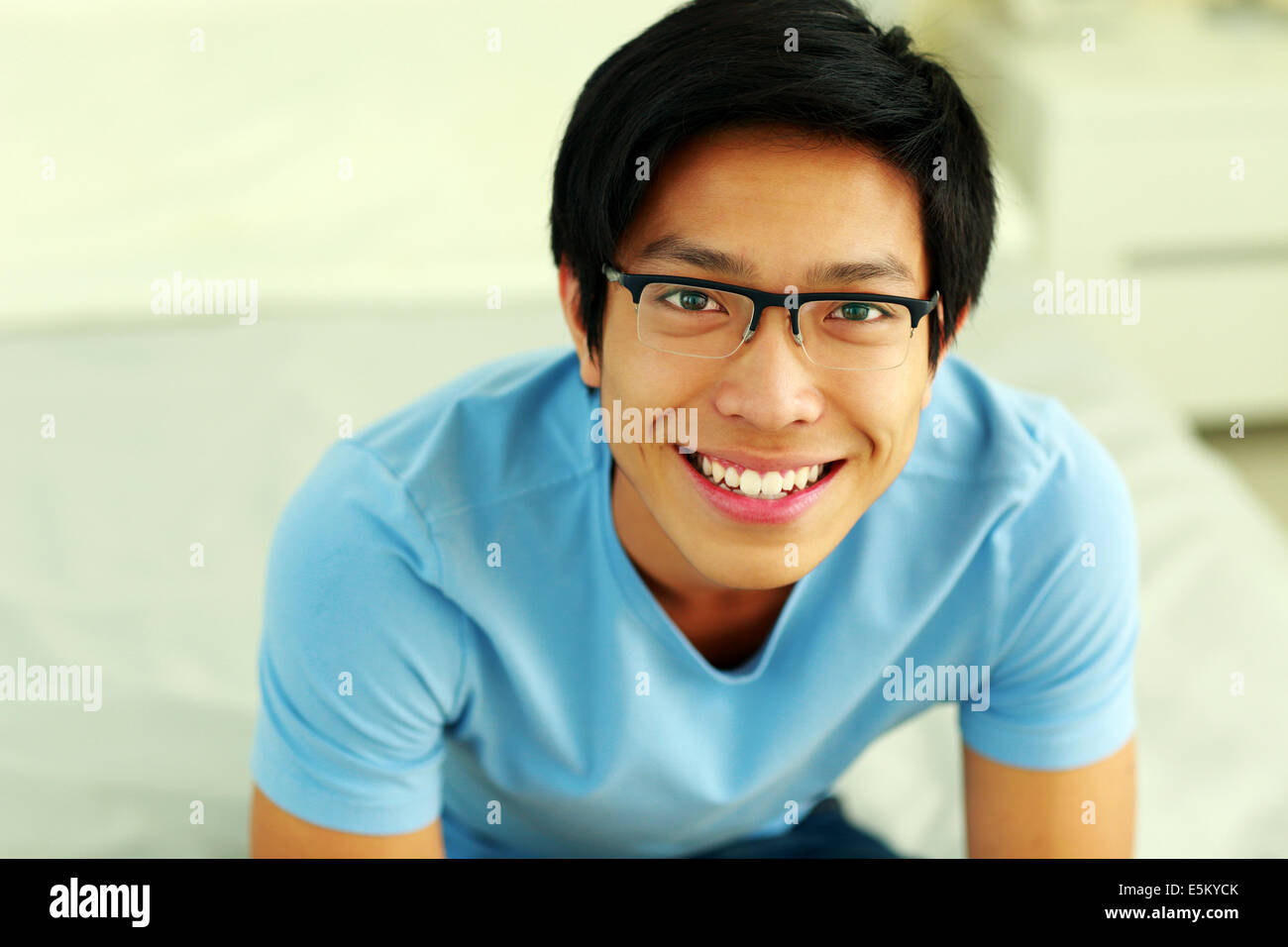 Closeup portrait of a smiling asian man Stock Photo - Alamy