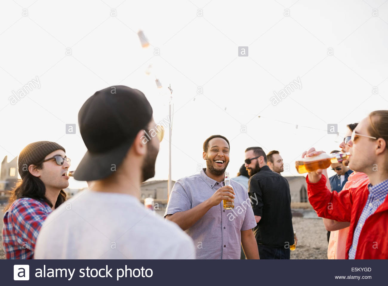 Drinking beer group young men party hi-res stock photography and images ...