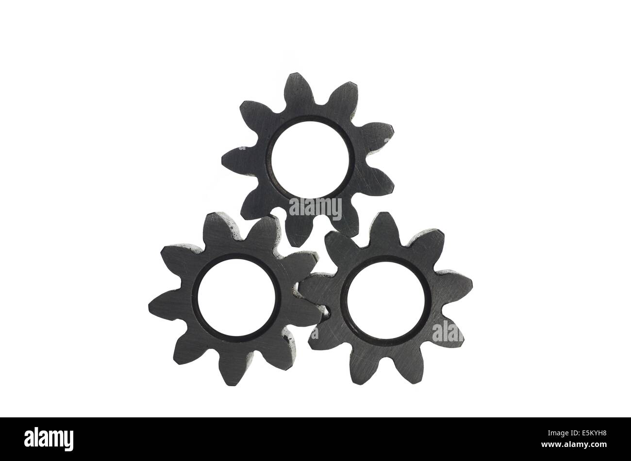 mechanism with three cog-wheels on white background Stock Photo - Alamy