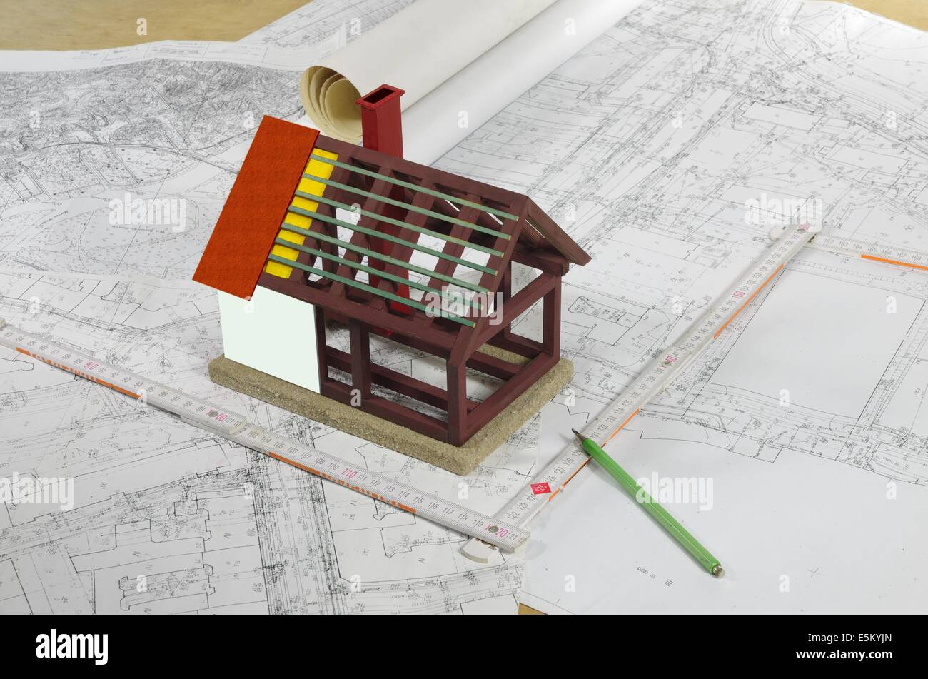 model of house wit plans and drafts on architect's desk Stock Photo - Alamy