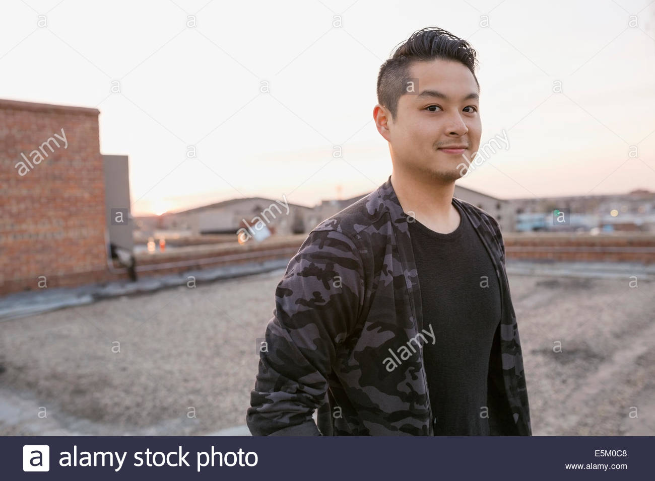 Rooftop man hi-res stock photography and images - Alamy
