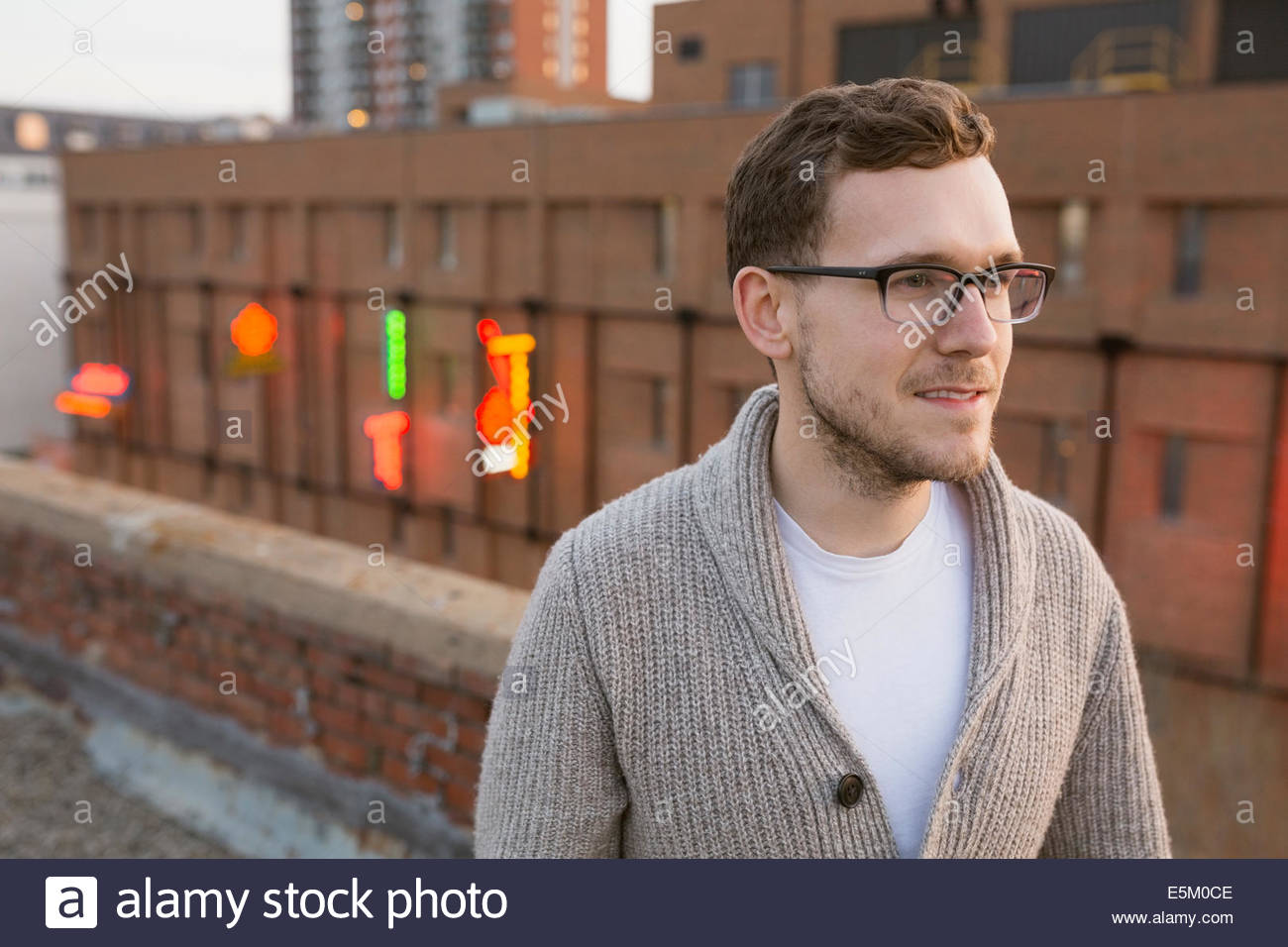 Man on rooftop hi-res stock photography and images - Alamy