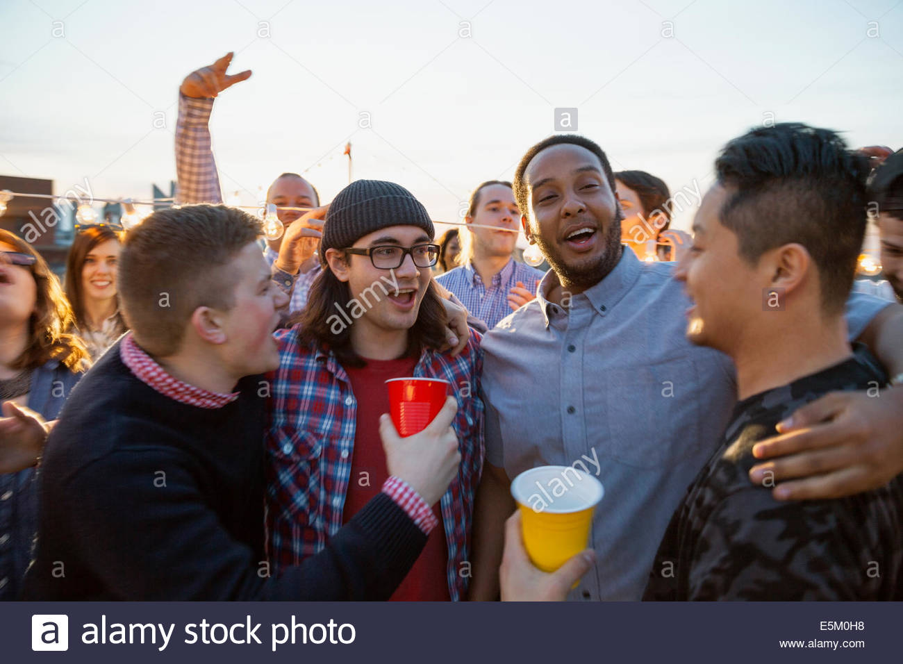 Friends party talking hi-res stock photography and images - Alamy