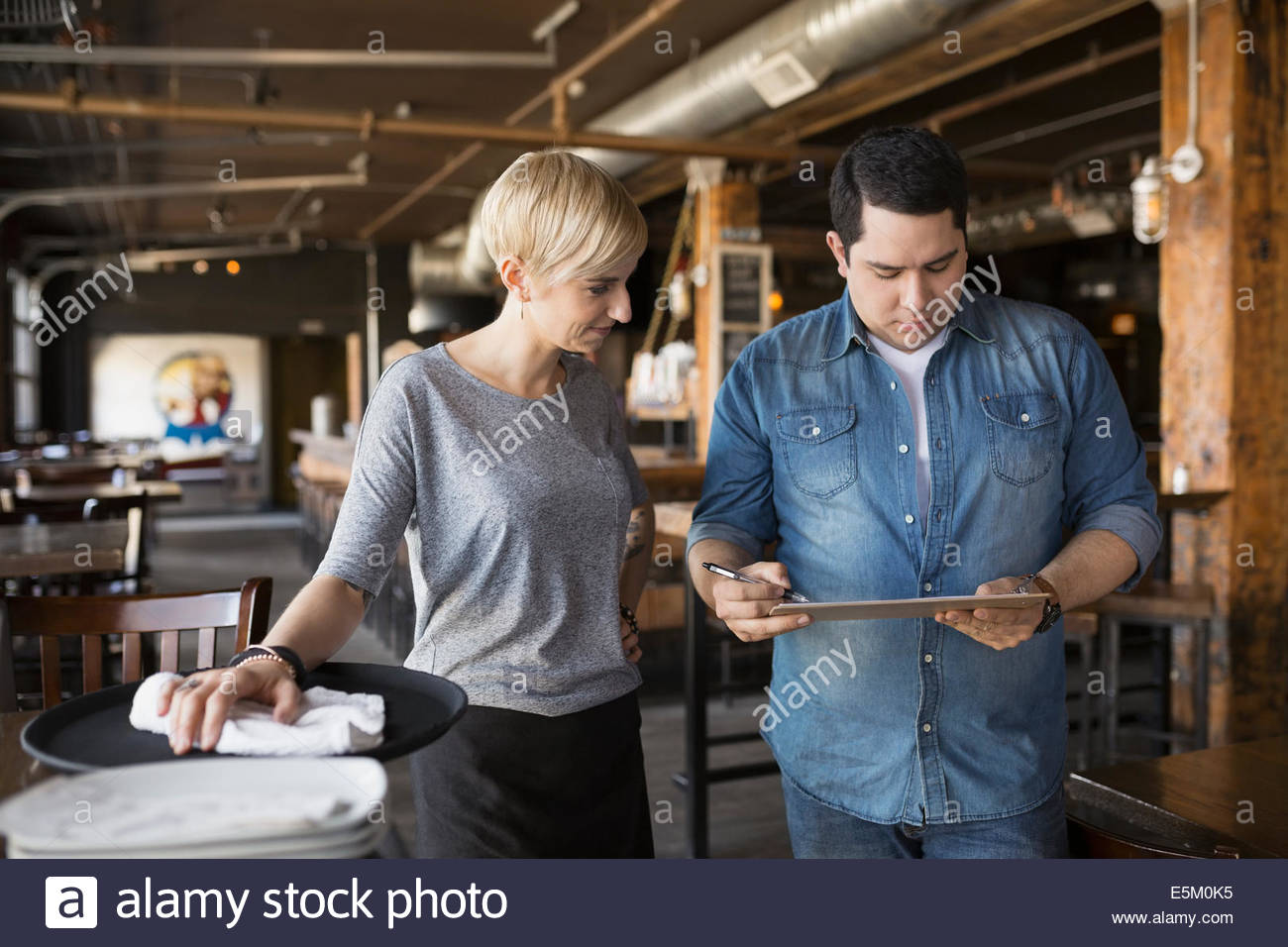 Two men at the pub standing hi-res stock photography and images - Alamy