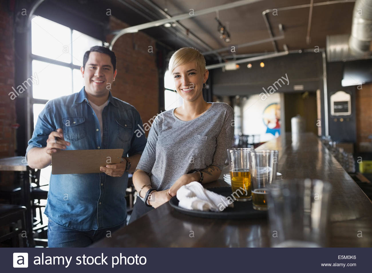 Two men at the pub standing hi-res stock photography and images - Alamy