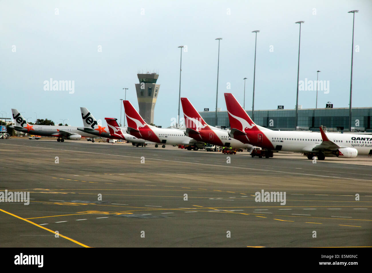 Qantas and Jetstar planes on the tarmac of Adelaide Airport Australia ...