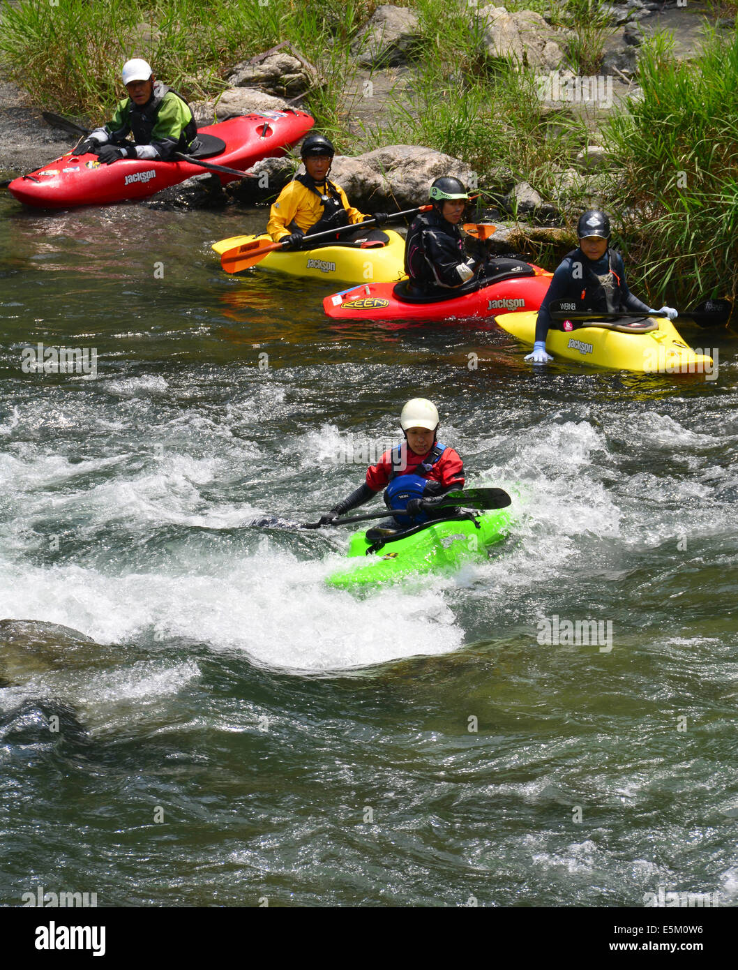 Oume, Japan. 3rd Aug, 2014. Holiday-makers find a cool relief from the ...