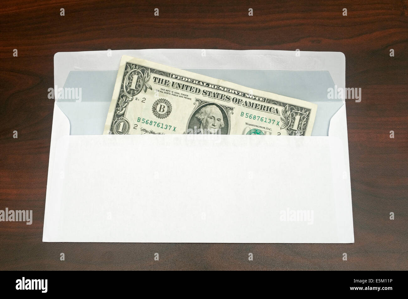 envelope with one dollar Stock Photo - Alamy