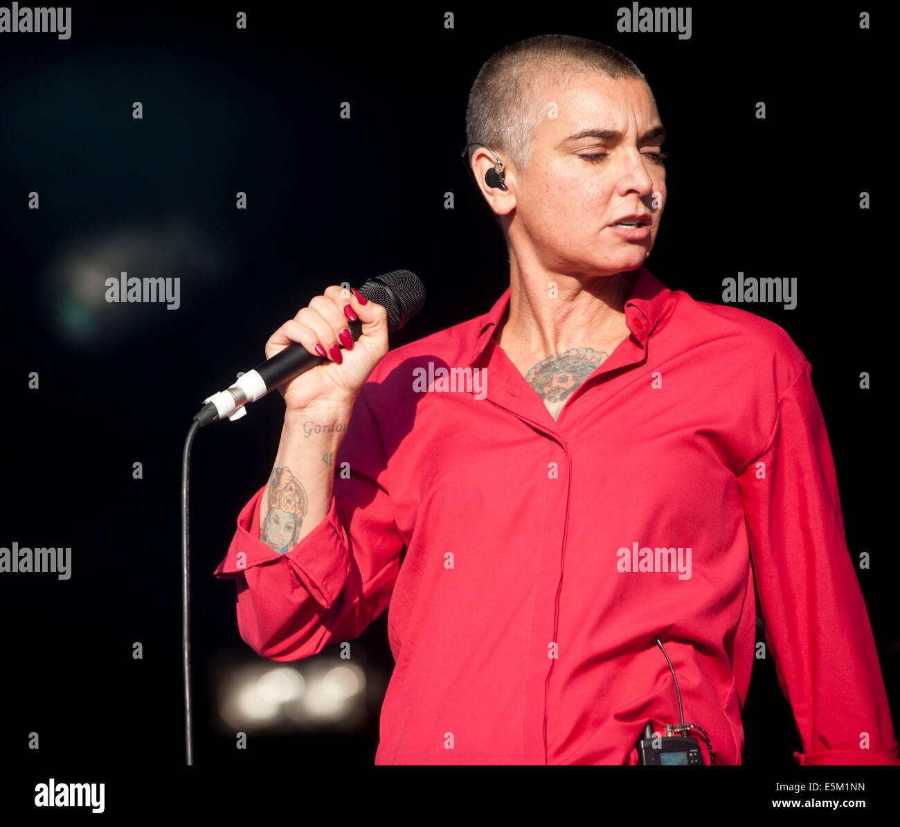 Lulworth Castle, Dorset, UK. 03rd Aug, 2014. Sinéad O'Connor performing ...