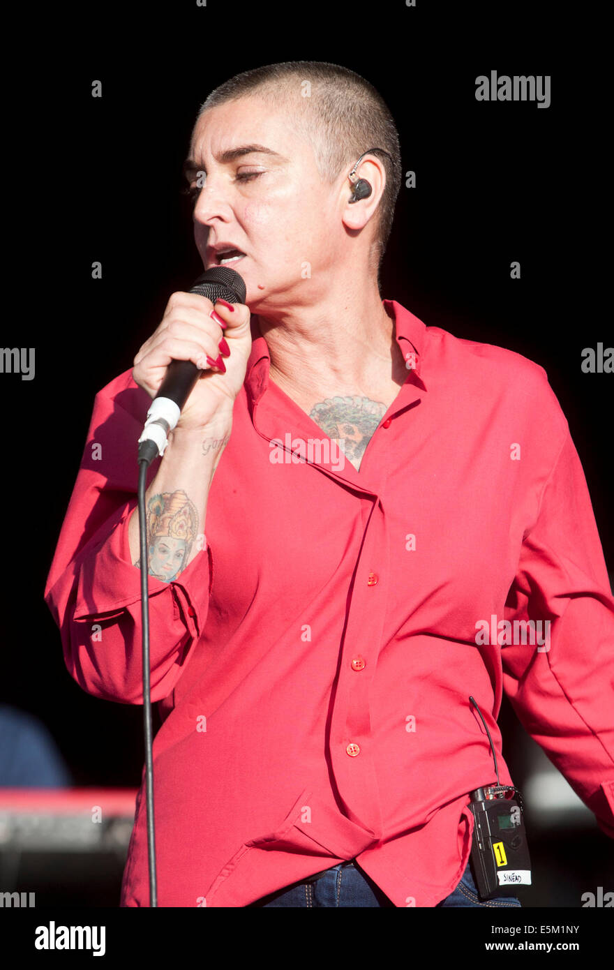 Lulworth Castle, Dorset, UK. 03rd Aug, 2014. Sinéad O'Connor performing ...