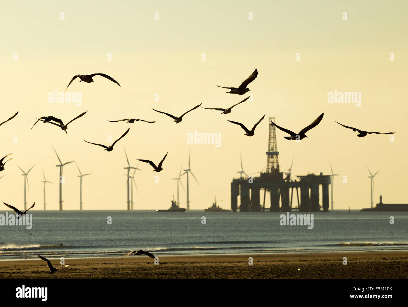 Oil, gas rig being towed past Teesside Offshore Wind farm at Redcar on ...