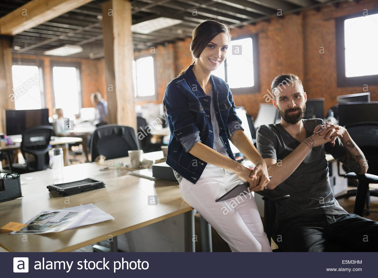 Portrait of confident business people in office Stock Photo - Alamy