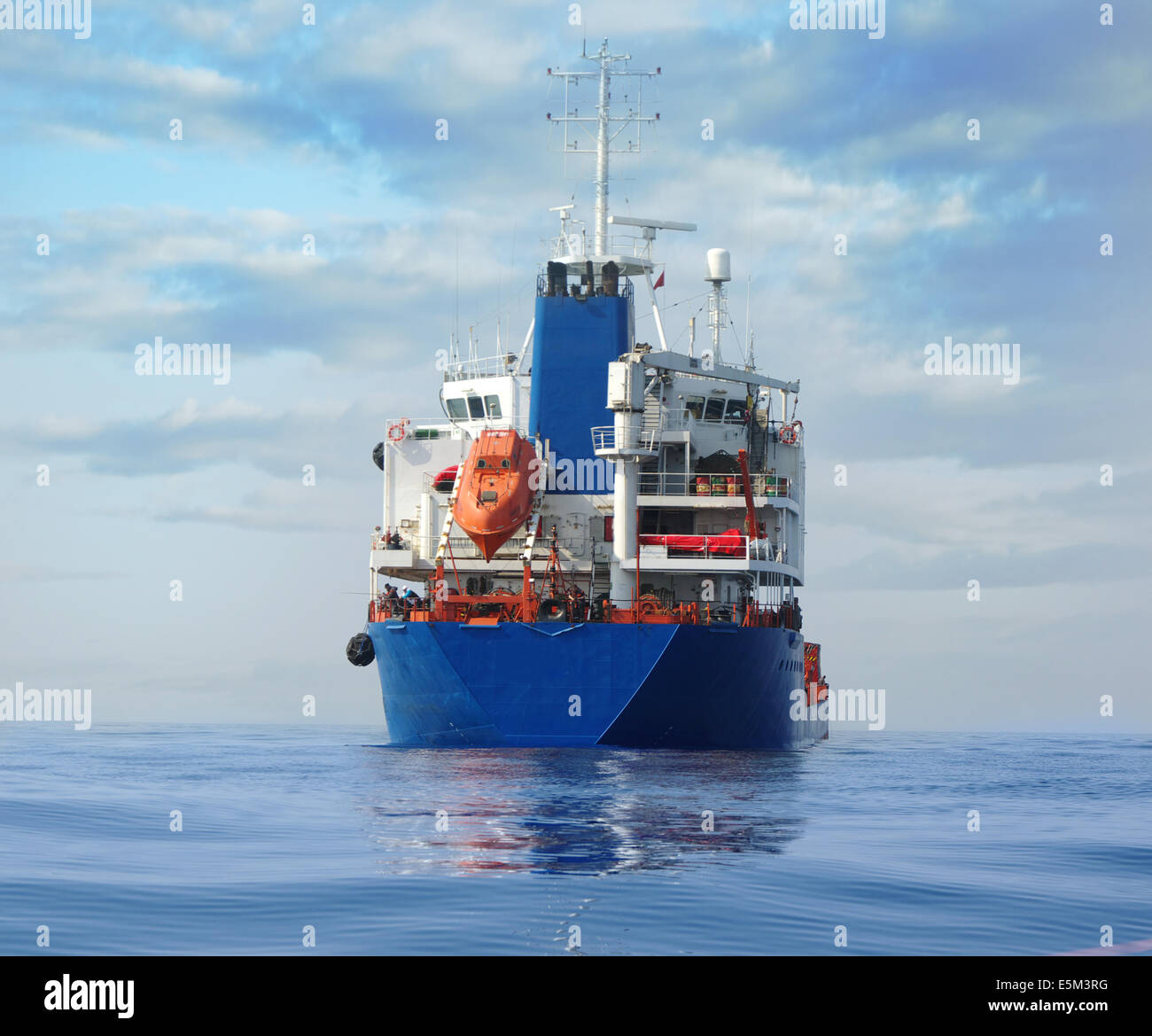 Tanker blue loaded back view in the ocean Stock Photo - Alamy
