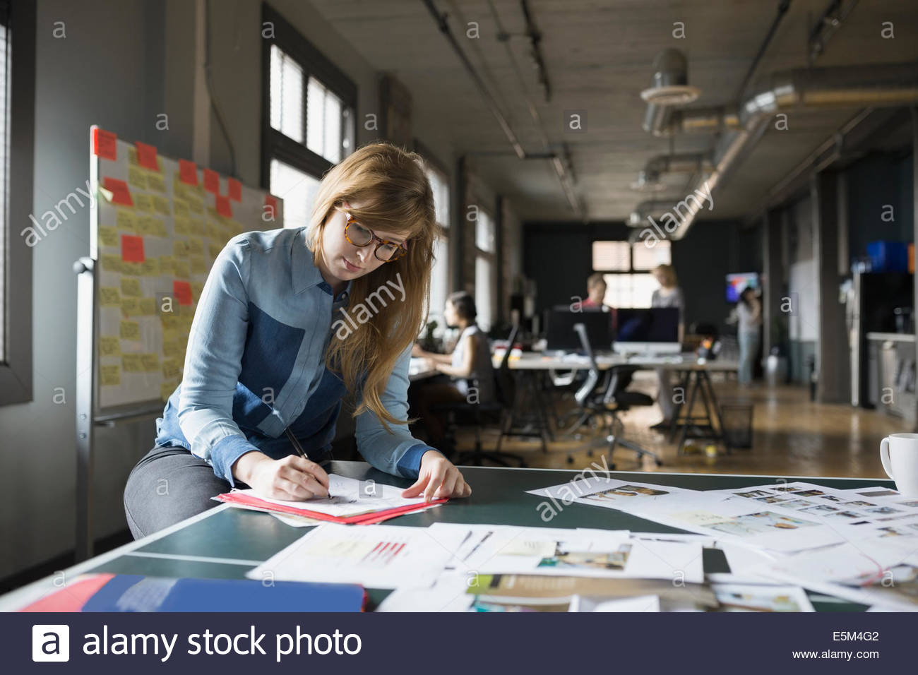 Toiling in the office hi-res stock photography and images - Alamy
