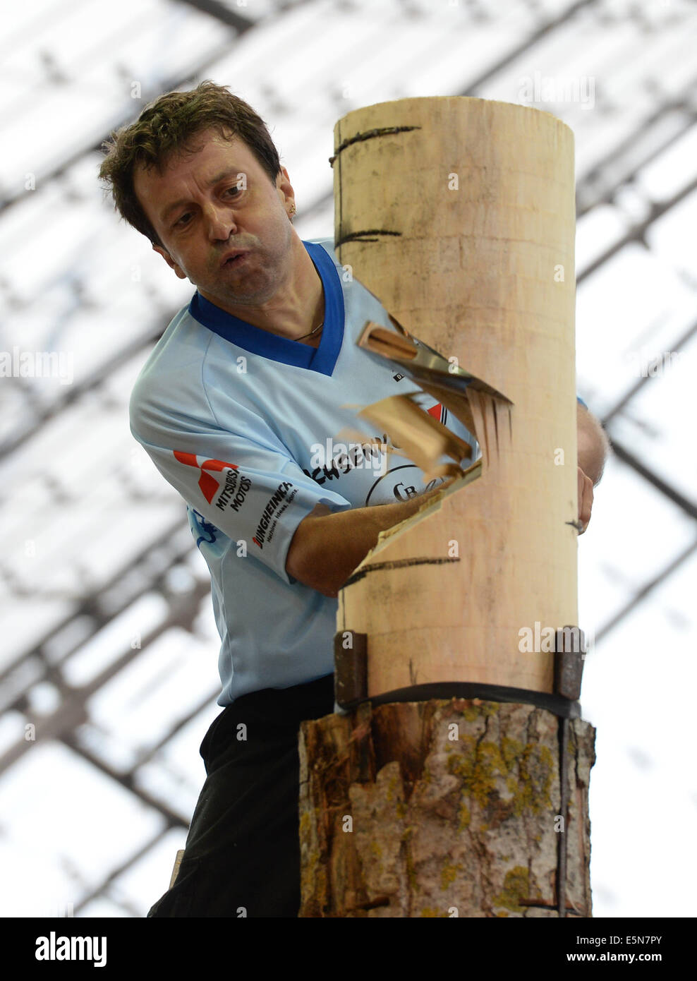 Munich, Germany. 02nd Aug, 2014. Timbersport athlete Ralf Dengler from ...