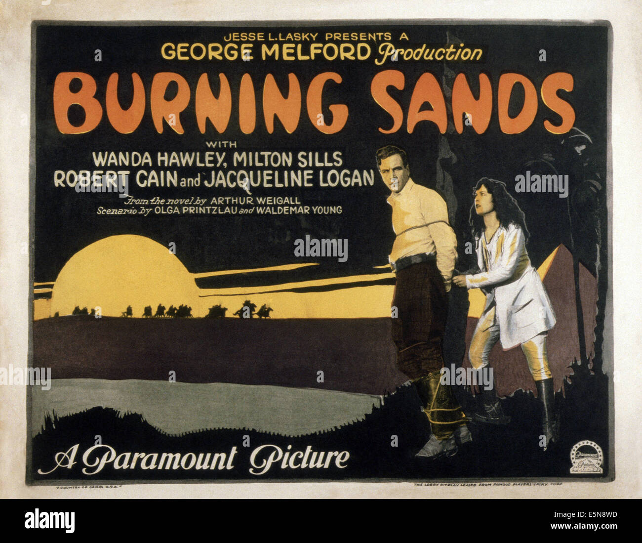 BURNING SANDS, from left: Milton Sills, Wanda Hawley, 1922 Stock Photo ...