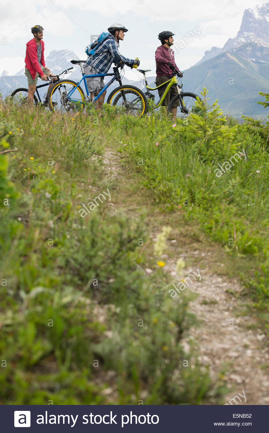 Three men on mountain bikes hi-res stock photography and images - Alamy