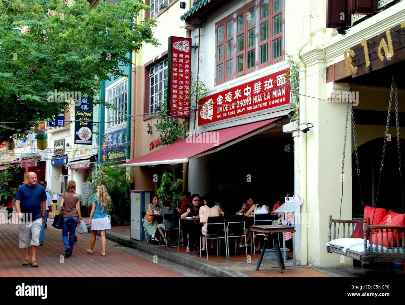 SINGAPORE: Visitors strolling past and dining at a La Mian Chinese ...