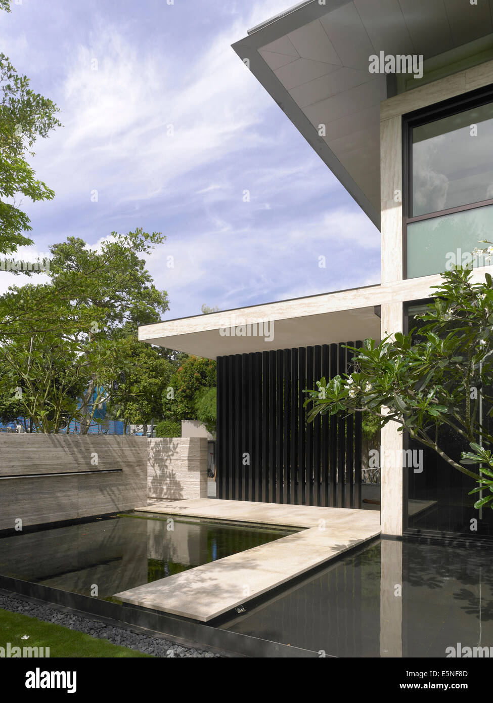 Water feature and tree, Private Residence, Singapore Stock Photo - Alamy