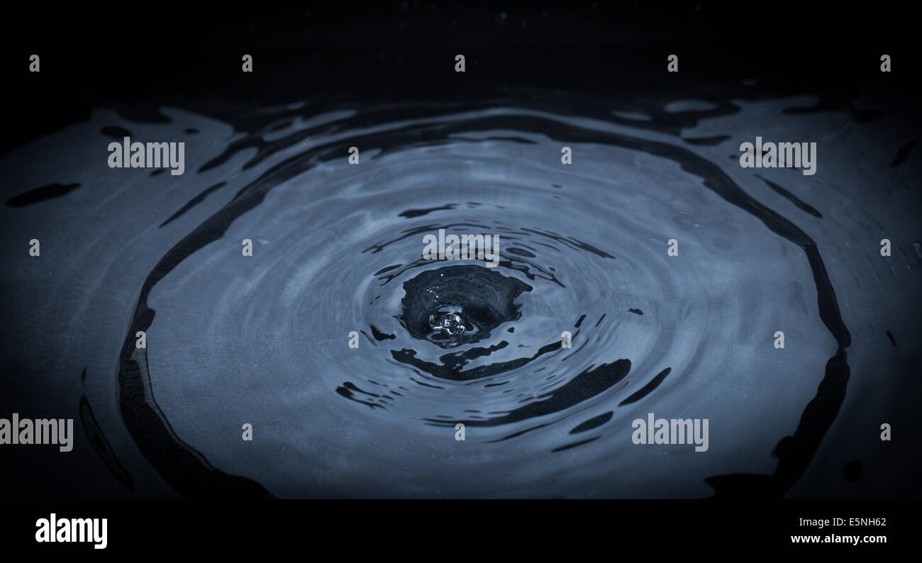 Close up of drop of water splashing in pool Stock Photo - Alamy