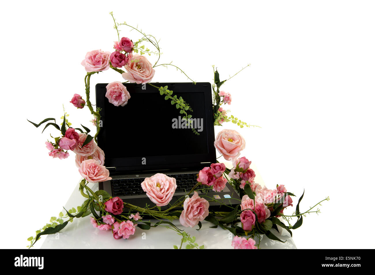Laptop with Flowers Stock Photo - Alamy