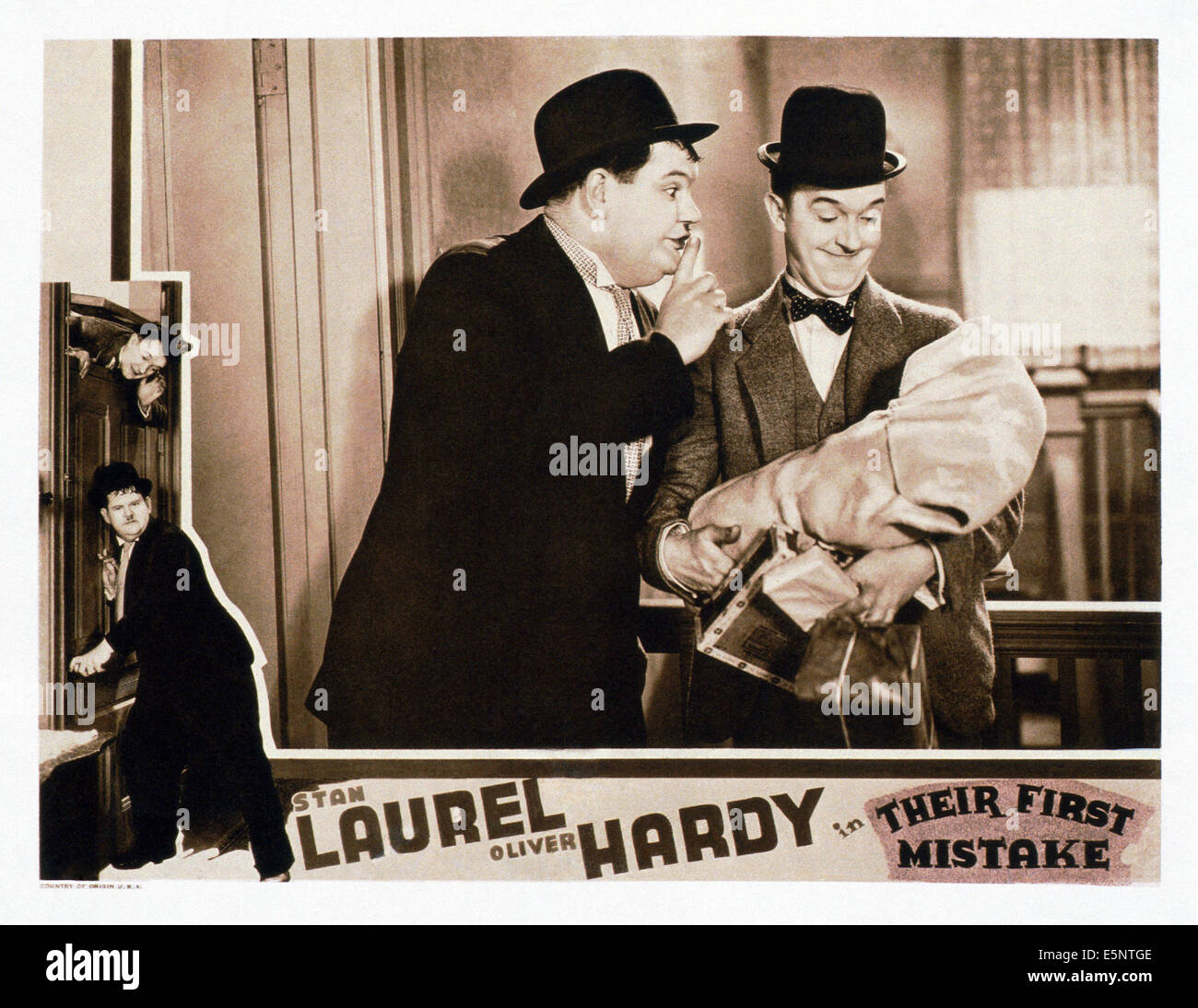 THEIR FIRST MISTAKE, US lobbycard, from left: Oliver Hardy, Stan Laurel ...