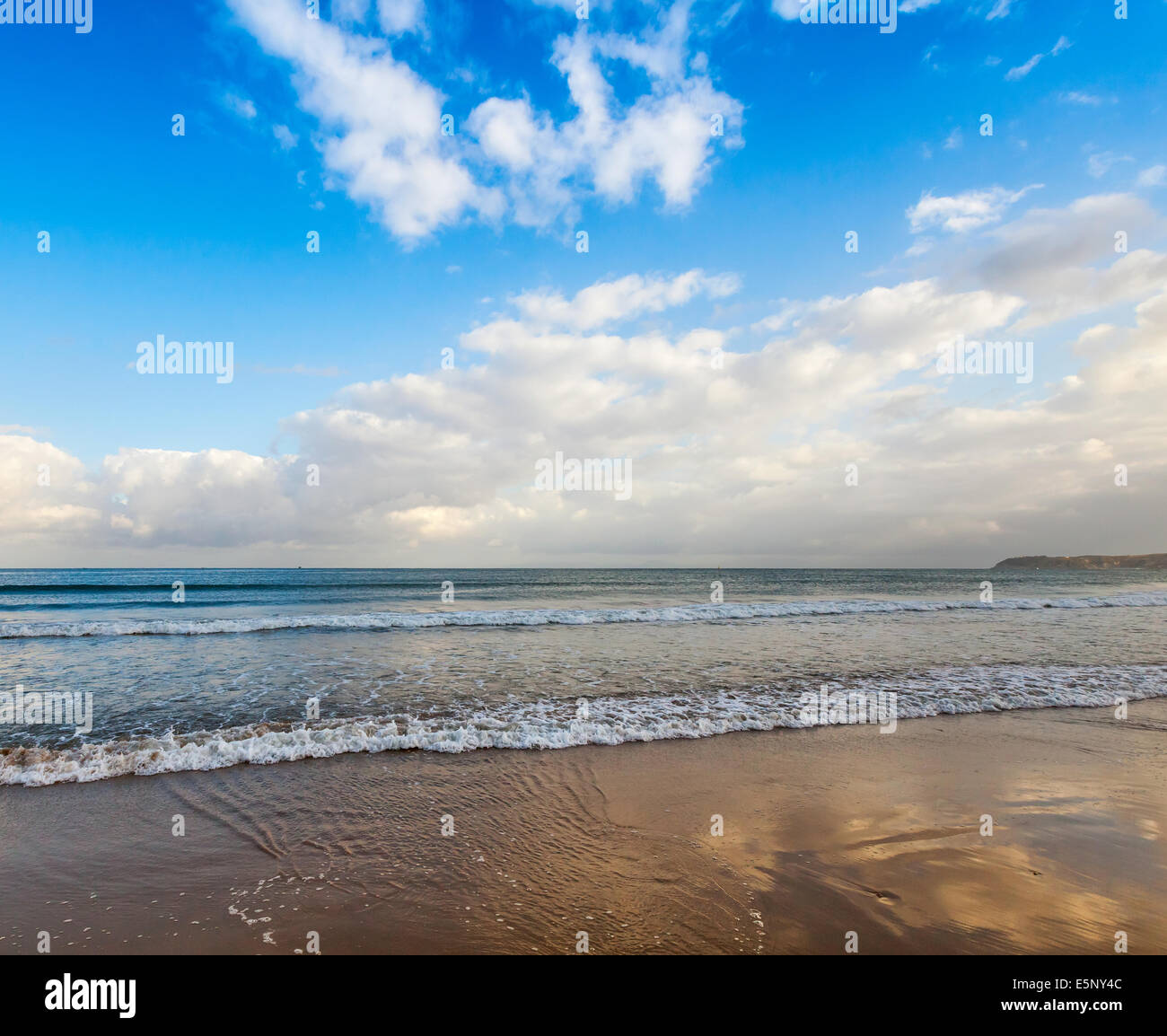 Atlantic ocean coast with waves and bright cloudy sky Stock Photo - Alamy