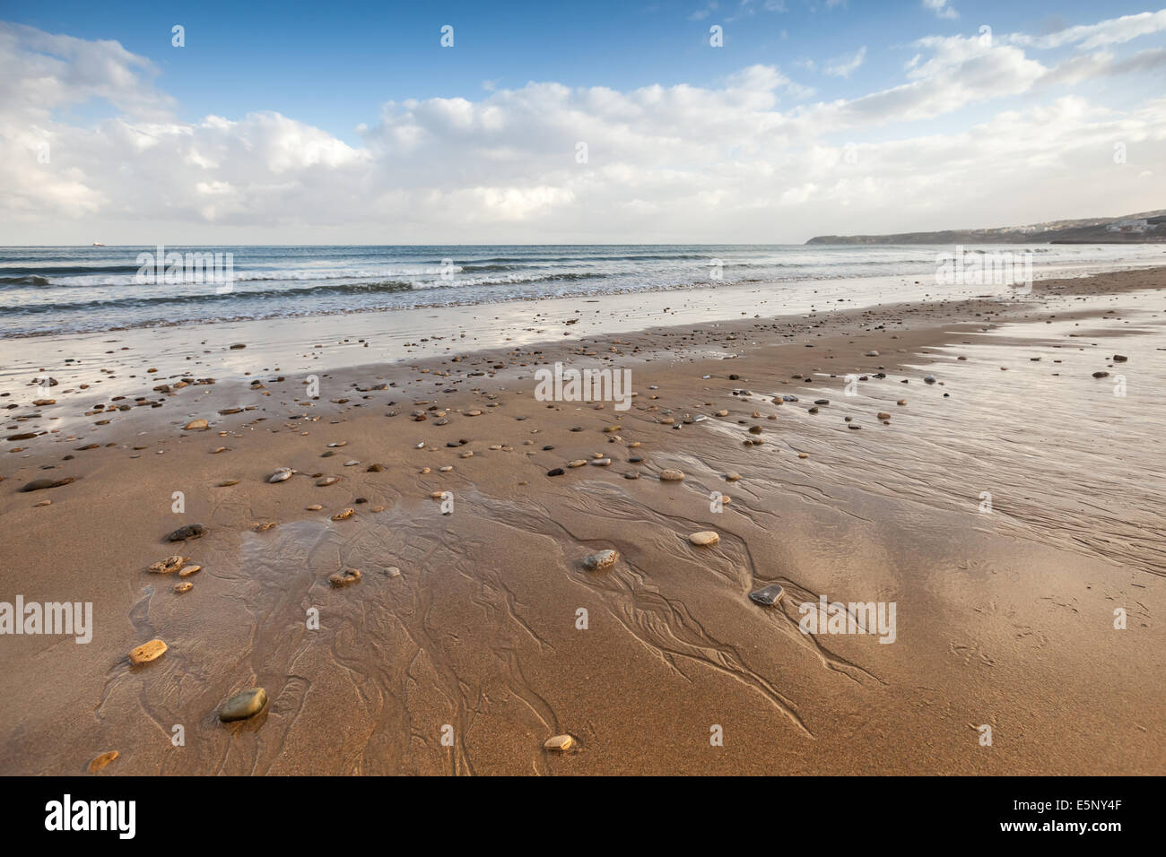 Wet sand and blue sky, Atlantic ocean, Tangier, Morocco Stock Photo - Alamy