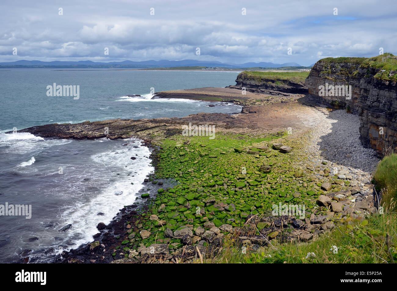Coastal landscape with erosional features on Creevy Shore Walk coastal ...