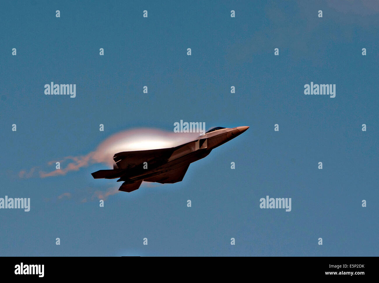 A US Air Force F-22 Raptor stealth fighter aircraft performs aerial ...