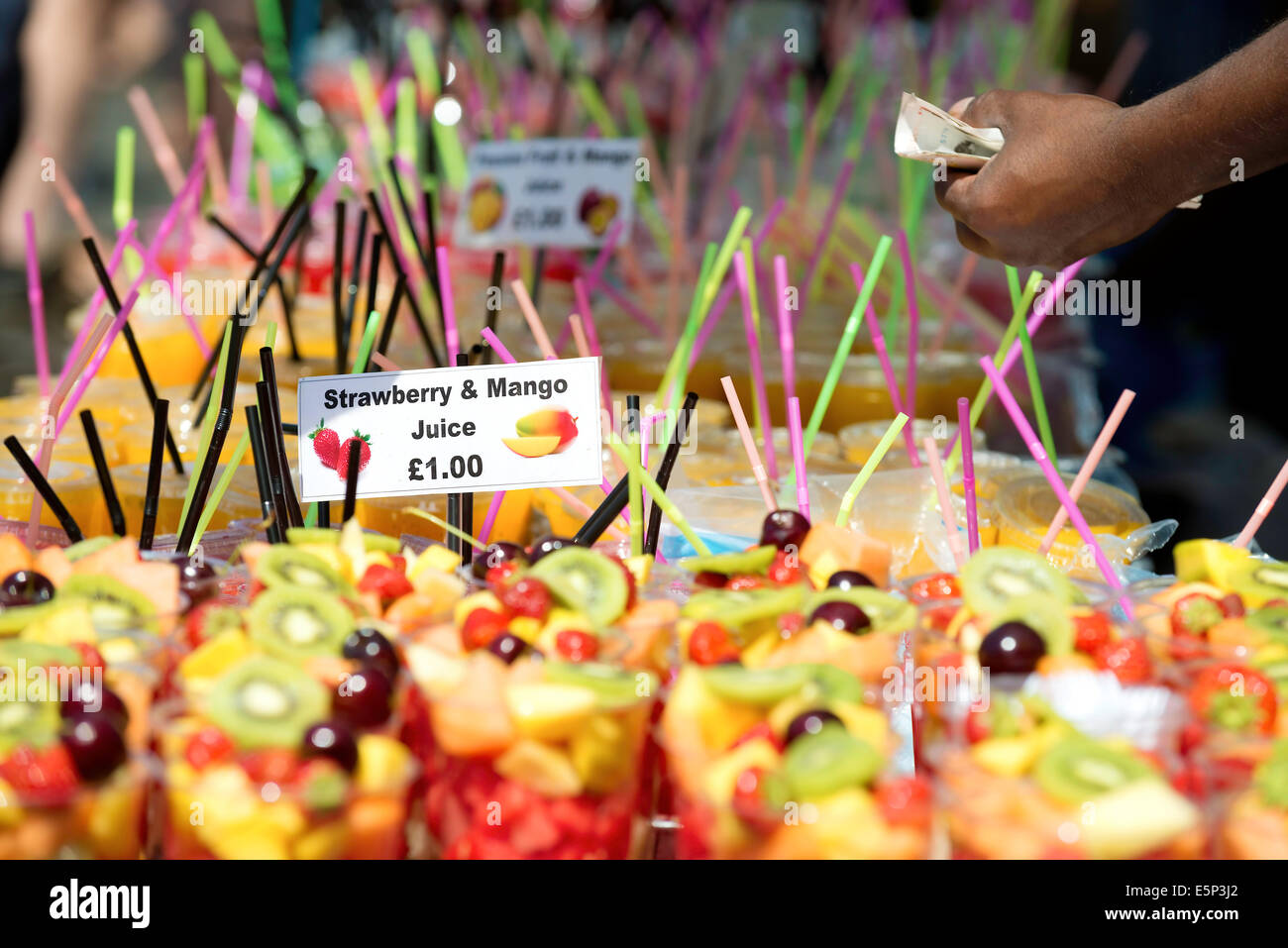 Fruit cocktails and fresh juices for sale at a street market Stock ...