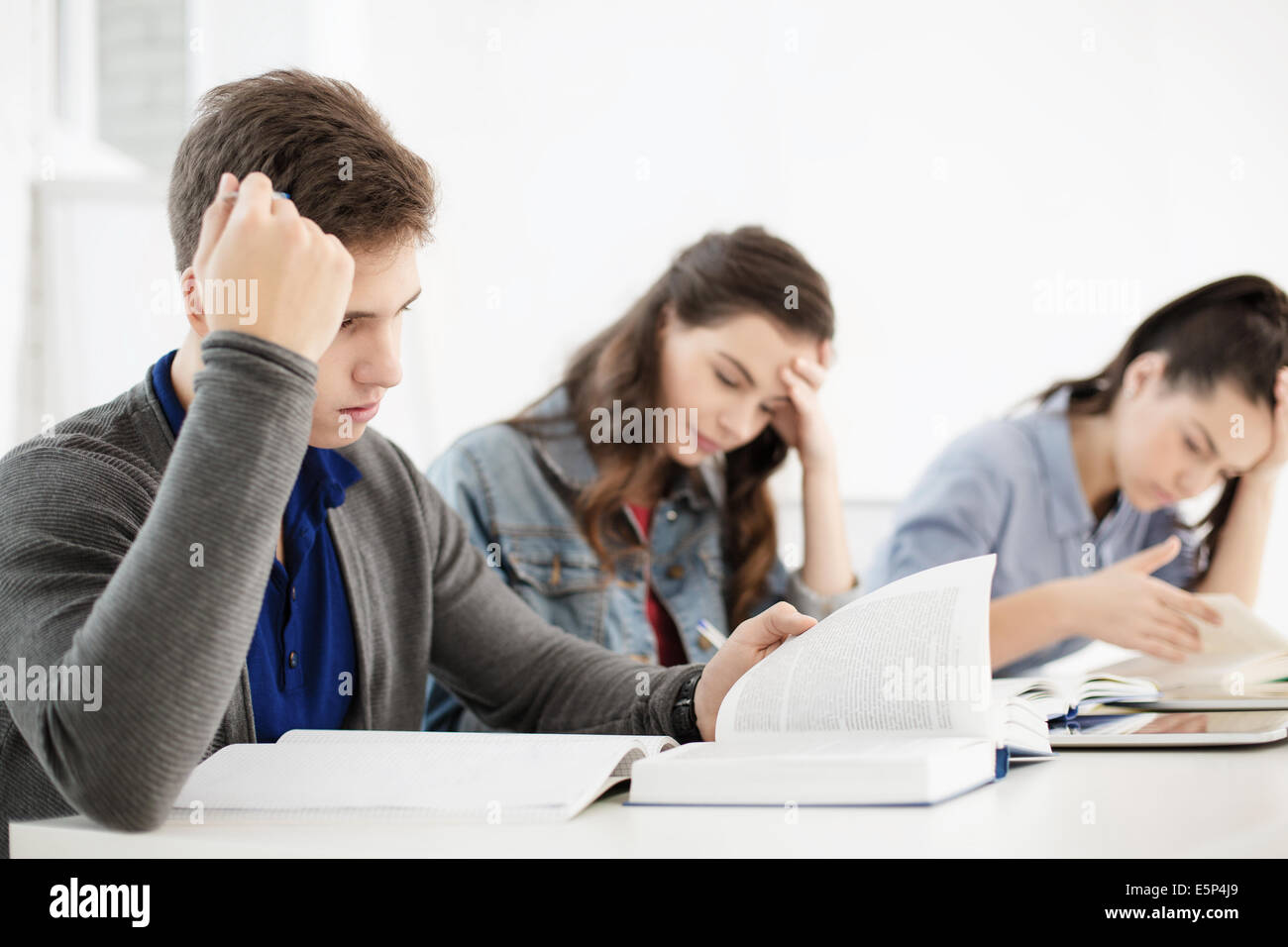 students with notebooks and tablet pc at school Stock Photo - Alamy
