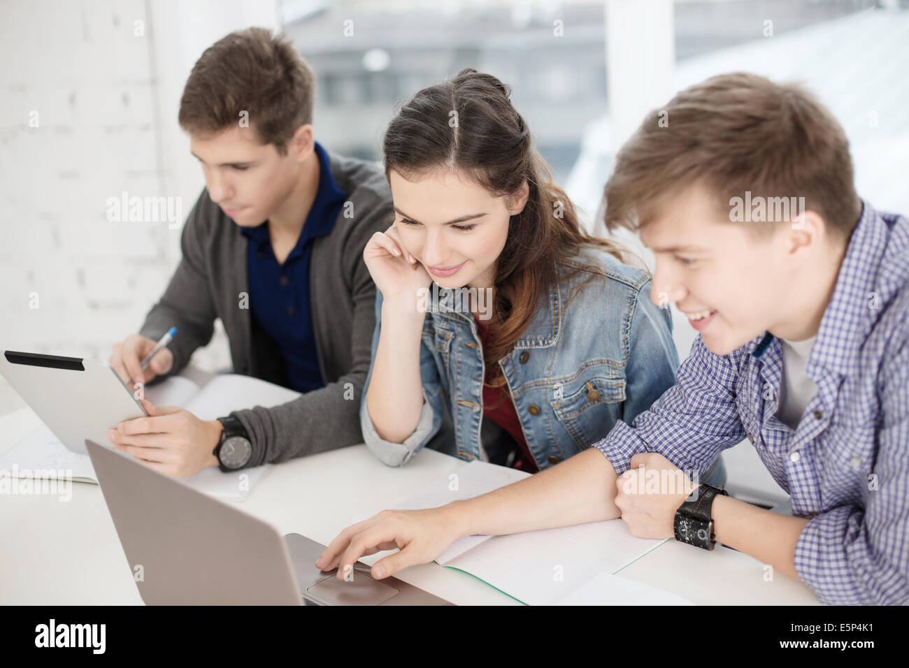 students with laptop, notebooks and tablet pc Stock Photo - Alamy