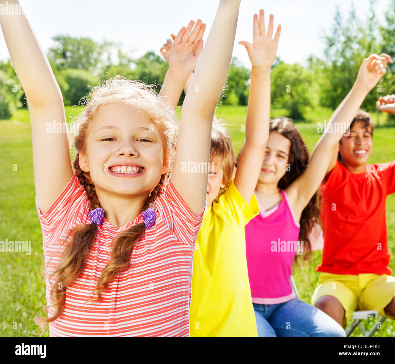 Group of four children hi-res stock photography and images - Alamy