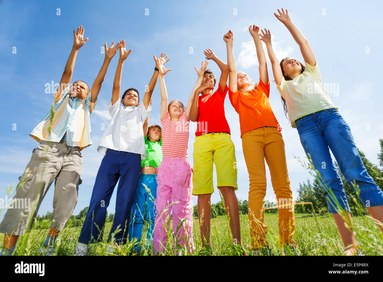 Stand arms up hi-res stock photography and images - Alamy