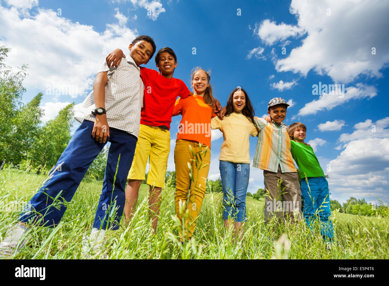 Kids standing in line arms hi-res stock photography and images - Alamy