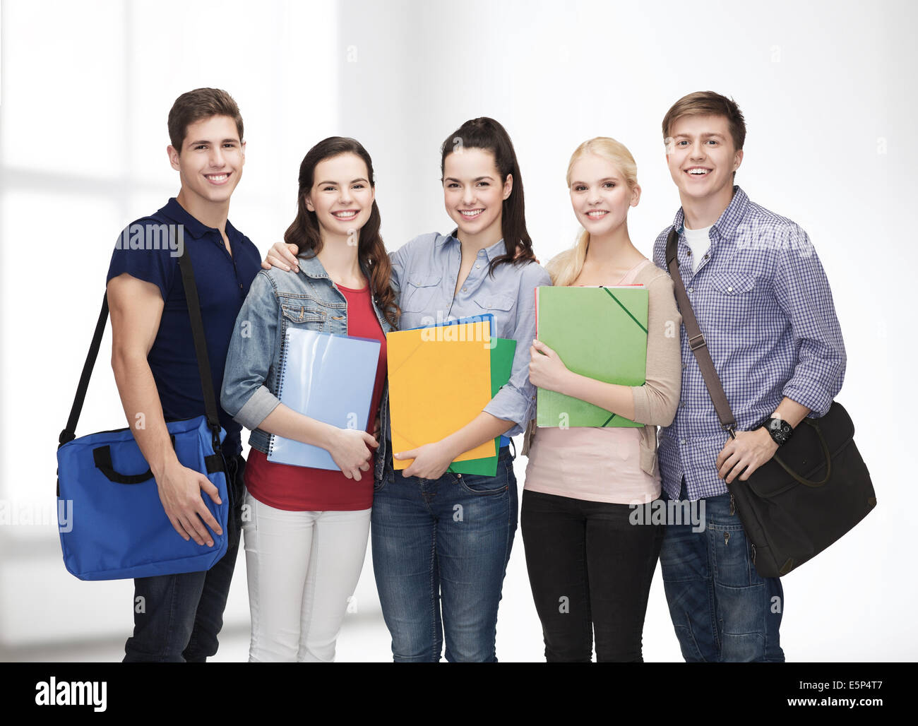 group of smiling students standing Stock Photo - Alamy