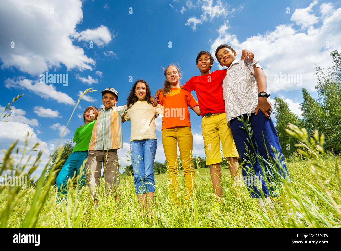 Kids standing in line arms hi-res stock photography and images - Alamy