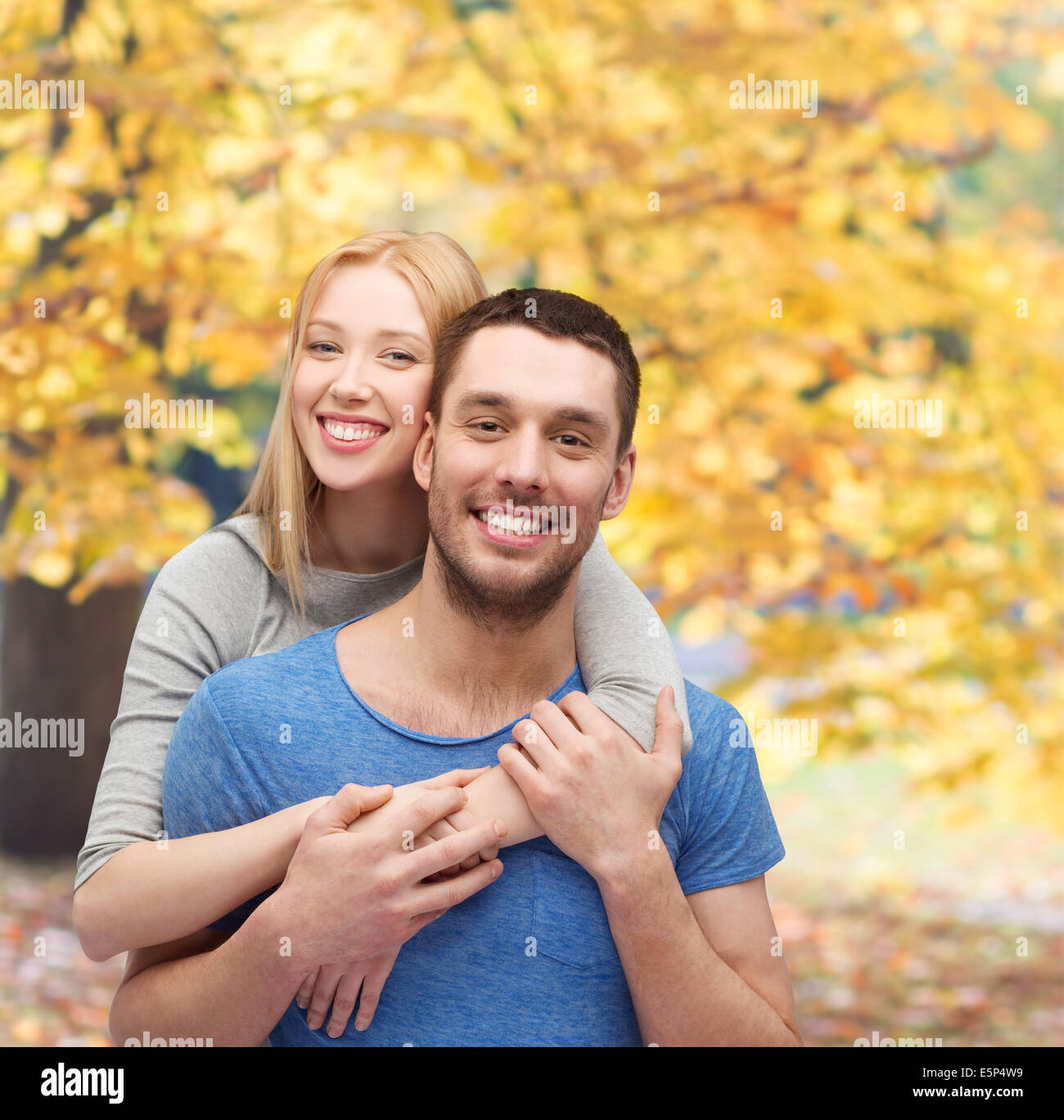 smiling couple hugging Stock Photo - Alamy