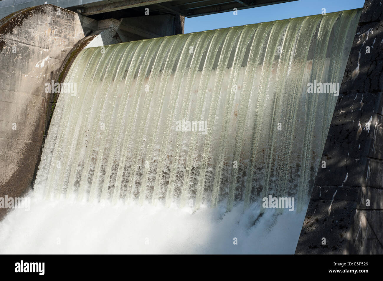 Capilano Lake water flowing out from the Cleveland Dam located in North ...