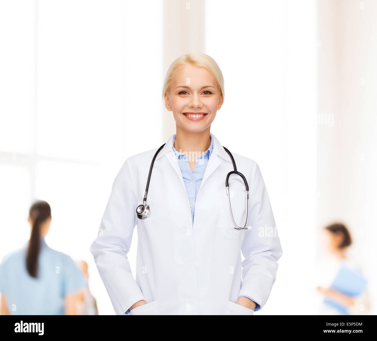 smiling female doctor with stethoscope Stock Photo - Alamy