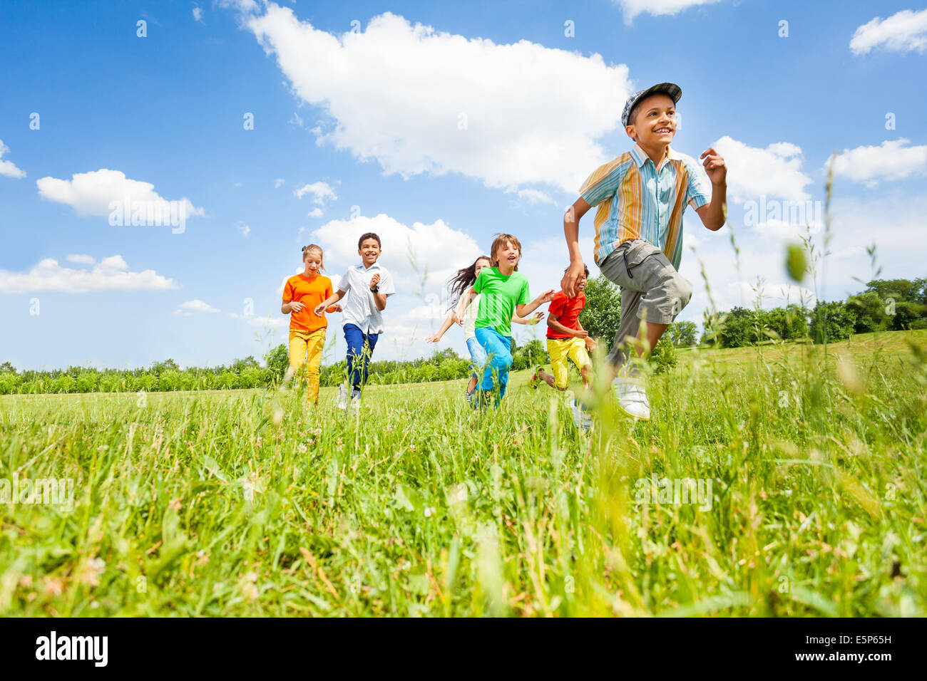 African kids running hi-res stock photography and images - Alamy