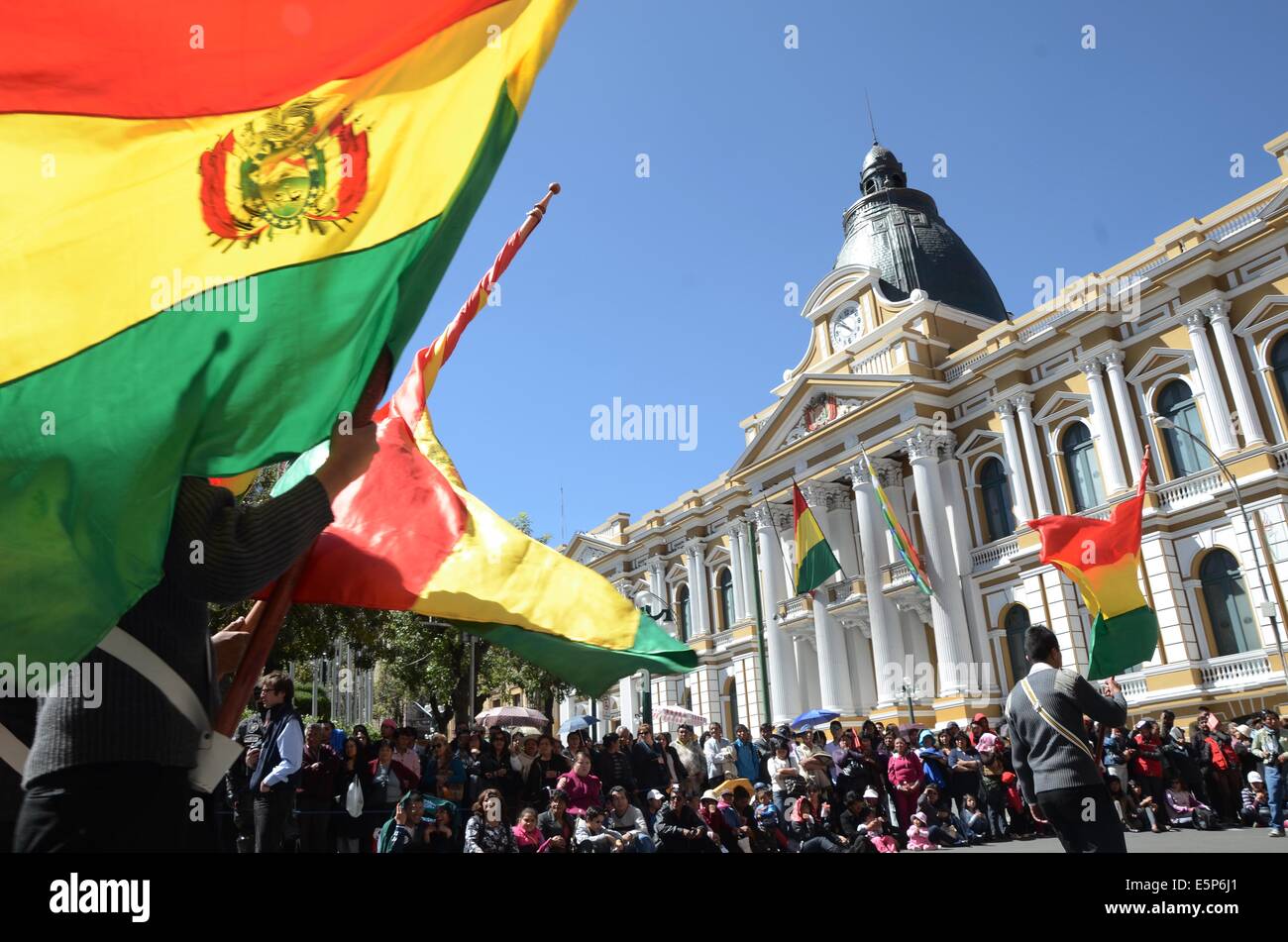 La Paz, Bolivia. 4th Aug, 2014. Residents watch an parade marking the ...